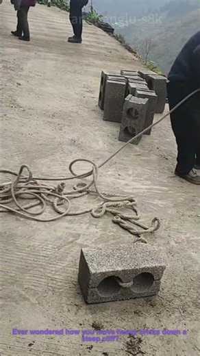 Cliffside Brick Transport: Using Ropes to Lower Heavy Blocks Down a Slope