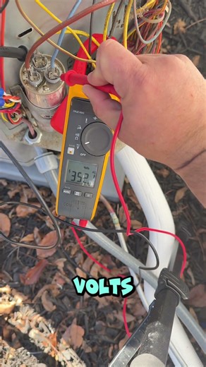 How do we measure a capacitor with the equipment running and powered on?