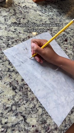 Homework Struggle: Mom and Daughter Doing Homework Together