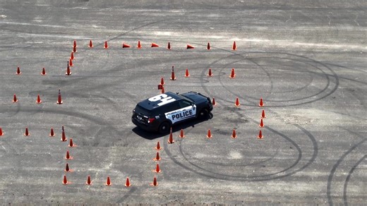 ON THE EVOC TRACK: This week, our new police recruits spent time on the Emergency Vehicle Operator Course (EVOC) with our certified instructors. They learned basic vehicle operations and emergent response driving and applying those skills when quickly and safely aiding in emergencies. We captured drone footage of one of the course obstacles and believe us when we say it's harder than it looks! It's all about making sure our officers are safe behind the wheel. | Garden City Police Department - KS
