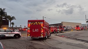 Smoke rises above Sports Arena area from industrial fire