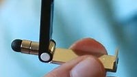 Accessory combines capacitive stylus, USB thumb drive, smartphone stand into one