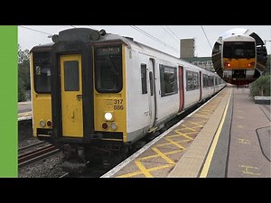 Class 317 departs Harlow Town