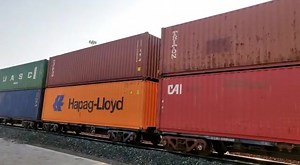 #10BillionDFC the first Double Stack container train arrived at Container Corporation of India Ltd. siding at Swarupganj in #Rajasthan today, the first Greenfield Private Freight terminal to be connected with DFC. This logistics hub will serve export-import container traffic at Ports & Northern hinterlands. | DFCCIL