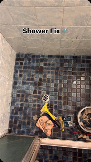 Hayley, Aaron, Vin and Jay on Instagram: "The bathroom is rank and we avoid using it at all costs. Thankfully we have a back up in the caravan. - tiles were just sitting and not attached - everything was mouldy - the smell 🤢 - plenty of water damage The handy sparky flicked the loose tiles up, water proofed, re-stuck the tiles on, and will grout and seal before we use it. Safe to say this is a temporary fix only and we will be redoing the entire bathroom soon 🤗"