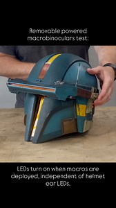 Powered macrobinoculars test: LEDs inside the macros turn on when lowered, and turn off when raised. One power button controls both macros and ear LEDs. Wasn’t sure I could get the macros to light up and still be removable without redesigning my MHAS system for this commission, but I’m glad I got it to work! 🥳 Now I just need to install the correct colour visor, touch up the weathering, and this helmet will be done! Thanks for looking! #mynocksden #starwars #mandalorianhelmet #mando #wip | Myno