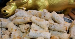 rice paper rolls Tourists prepare and eat spring roll with rice paper wrapper or banh trang at night streetfood market. Traditional Vietnamese nem dish, asian cuisine. Close up Stock Video