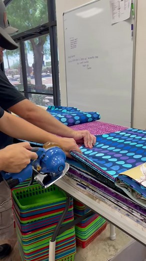 How many layers of fabric can Teancum cut through without jamming the slicer?! #sew #fabric #fabriccutter #sewyeahquilts #sewyeah #quilting