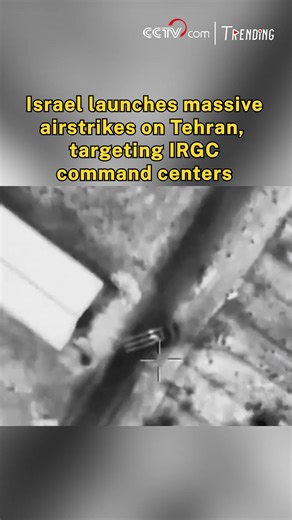 More than 100 Israeli fighter jets carried out a large-scale airstrike on Iran's capital, Tehran, in one of the most significant military operations in recent months. The Israel Defense Forces said the strikes targeted dozens of headquarters linked to Iran's Islamic Revolutionary Guard Corps, including intelligence units, air force facilities, and internal security command centers. Newly released footage also shows precision attacks on air defense systems and ballistic missile launchers in weste