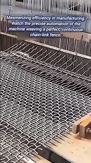 Automation: Chain-Link Fence Weaving Machine In Full Motion.