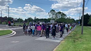 Protesters march from town square to Louis L. Redding Middle School Sunday afternoon. | The Middletown Transcript