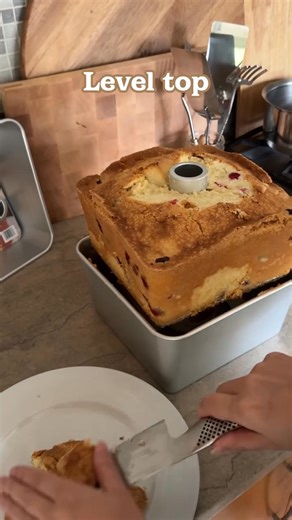 Natalie just asked me how I trim the top of the cake so I put together this quick video showing how I usually present my cakes! They’re mostly all inverted with a leveled top - I snack on the cut off bits! This cake is our Mile High Orange Cranberry Pound Cake (recipe at oldcountrykitchenware.com) | Old Country Kitchenware