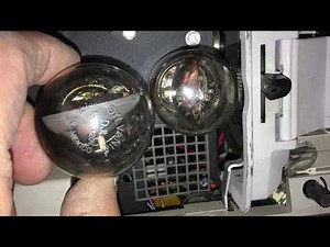 How to Change Bell & Howell 8mm Movie Projector Light bulb and Cannibalize Part from another Unit