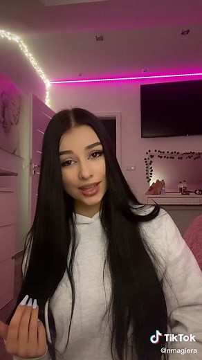 Long Black Hair Styling Techniques in Pink LED Room