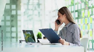 Businesswoman working in finance and accounting, calculating return on investment, planning company budgets.