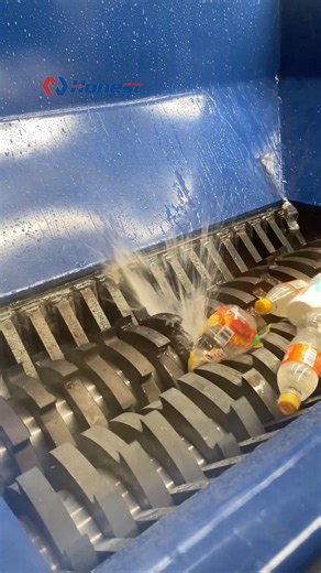 Dual-shaft shredding of plastic bottles with liquid separation #plasticbottleshredder #LiquidFilledbottle #plasticrecycling #shreddingplastic #plasticwasteshredder #plasticbottle #wasteplastic #doubleshaftshredder #recycling | Solid Waste Shredder