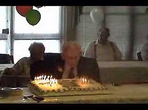 100 Candles+2 Cakes/1 Determined Man