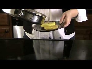 Chef Erin prepares Pineapple Flambe