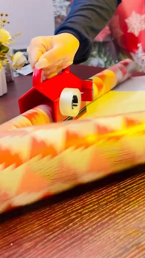  Tired of wrestling with scissors/tape, uneven paper tears, sloppy edges, or lost tape this holiday? ✂️ Our Wrapping Paper Cutter fixes it—one smooth motion for clean cuts, built-in tape dispenser to seal instantly! No more wrapping chaos! ✨ | Destinek | Facebook