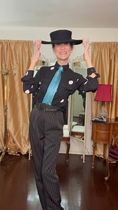 Whether you call it a Menswear look or Ladieswear, this mixed pattern outfit with a pop of color in the tie makes a statement! #styleinspo #hat #howtotie #popofcolor #ootd #melania | Positively Cathy