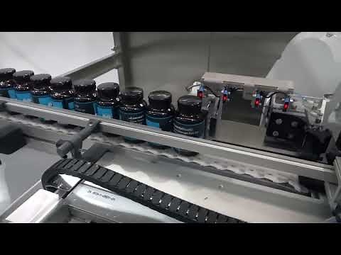Shelf ready label orientation in an automatic tray loader