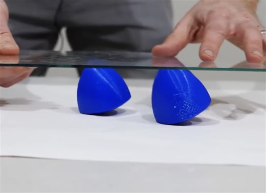 Weird triangle wheels roll like circles