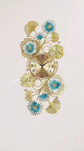 9.8K views · 85 reactions | Golden & Teal Color Metal Body Ginko & Aqua Leaf Design Wall Clock Vertical Width: 17 Inches; Vertical Height: 35 Inches; Dial Diameter: 8.5 Inches; Price with Details: https://www.cynor.com.bd/product/golden-teal-color-metal-body-ginko-aqua-leaf-design-wall-clock/ | Cynor - সাইনর | Facebook