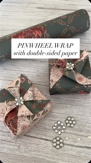 Another pinwheel wrap using my favorite double-sided paper from @bespokepress and bejeweled stickers to embellish the center. #giftwrapping #wrapping #wrappingpresents #giftwrap #giftwrapideas | Carrie Larson