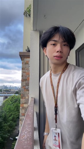 Scenic Balcony View: City Skyline and Personal Style