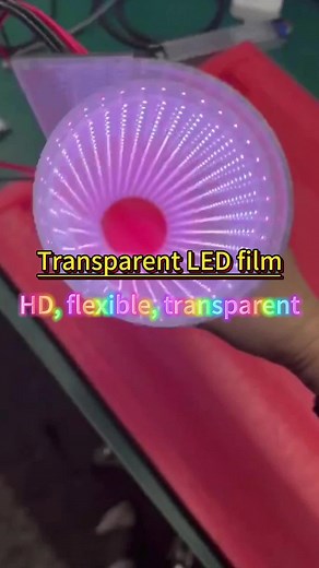 This is flexible LED transparent film screen 3mm ultra-thin design Transparency 90% No structure required Directly attach to glass for installation Turn on the power to play the video #ledtransparentfilm #leddisplay #ledtransparencescreen #ledglassscreen #ledsigndesign #ledwall #filmtransparent #ledfilm #HTURGBFILM #hturgb