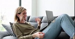 Young happy woman video call and gesticulating hello to friends. Attractive female blogger recording new video for subscribers