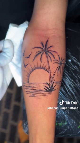 Beach Tattoo Ideas: Sunset and Henna Designs