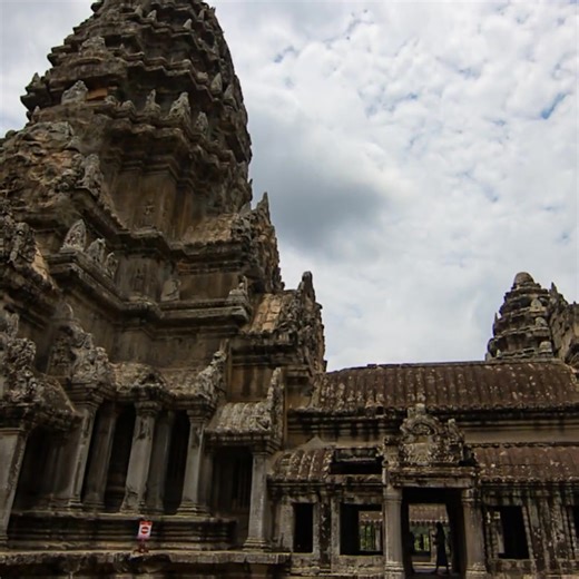 "Angkor Wat Tower" Angkor Wat Temple in Cambodia in South East Asia. There are a lot of thing to appreciate. For those who are religious, it is the largest religious monument in the world. For those who can appreciate architecture or archeology, there is much to wonder over. Take a tour of Angkor Wat here. See link in Bio | Dredd Photos