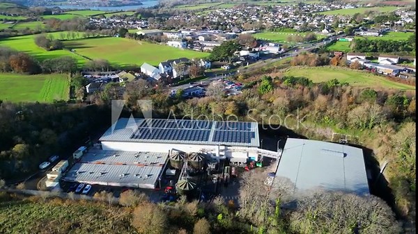 Churston, Devon, England: DRONE VIEWS: A sewage treatment plant with solar panels on its roof; the panels power sewage treatment in the plant. Solar power is part of the 2030 net zero initiative.
