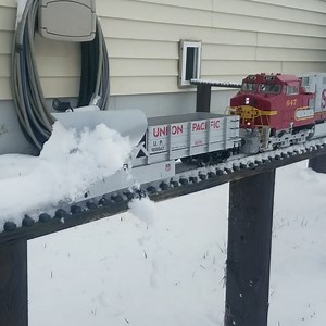 Small train moving through snow! | Creative Bee