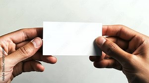 hand holding a white, blank business card against a transparent background. Ideal for corporate business advertising and branding presentations, with ample space for custom informa