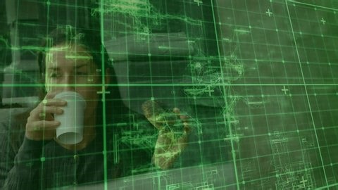 clip-3999201811-woman-sipping-coffee-triggers-animated-schematics-overlay