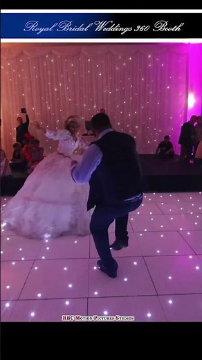 Beautiful bride and father in law dance