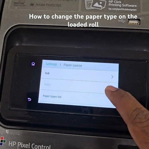 How to change the paper type of the loaded roll on hp design jet.