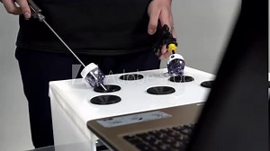 Close up of hands of surgeons team during operation uterus removal with surgical laparoscopy instruments. Gynecology. Team surgeon at work on laparoscopy operating in hospital. Close up.