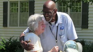 Huge neighborhood party for mailman goes viral