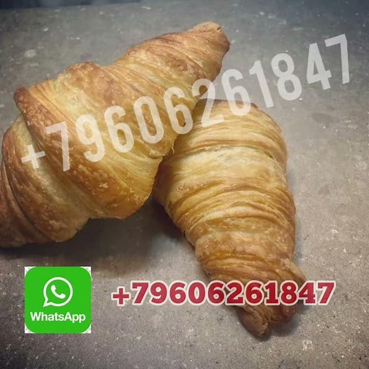 Manual dough sheeter for rolling out puff pastry when making croissants