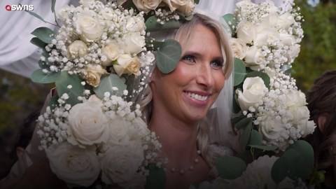 Amputee bride who lost legs snowboarding walks down aisle using new prosthetics