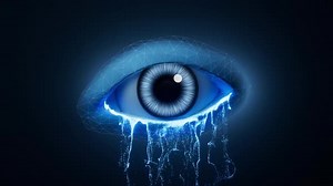 An eye in the dark with vfx particles