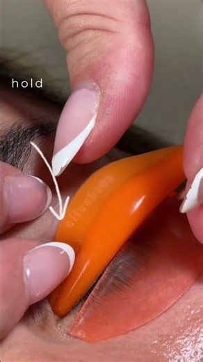 Notice that finger on the inner corner?