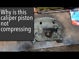 Why is this brake caliper piston not compressing