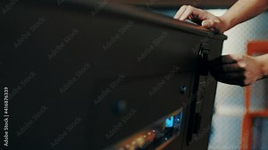 Insert coin in arcade hall machine, pool table to play a game