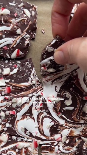 1.3K views · 3 comments | Dark Chocolate Peppermint Bark with Swirls of marshmallow. I LOVE this Christmas treat it is so easy and fun to make & beautiful in a cookie box. Temper the chocolate if you want to but half of the time I don’t even care & just eat it right out of the fridge. 3 ingredients: 10 oz bag of dark chocolate chips 1/2 cup marshmallow fluff 2-3 candy canes crushed https://homecooksnotes.com/dark-chocolate-peppermint-bark/ | Sam Florio - Home Cook | Facebook