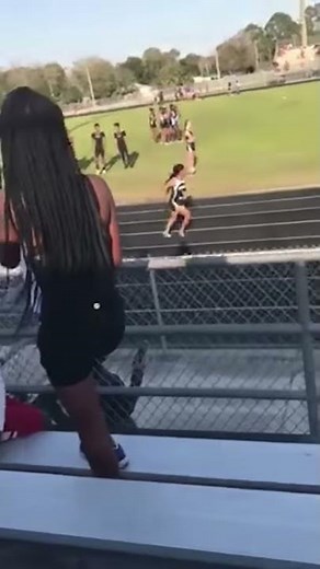 Track and Field Runner Takes Spill on First Hurdle But Still Finishes Race