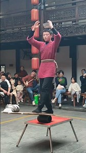Young man achieves impressive bowl balancing feat in Hubei, China